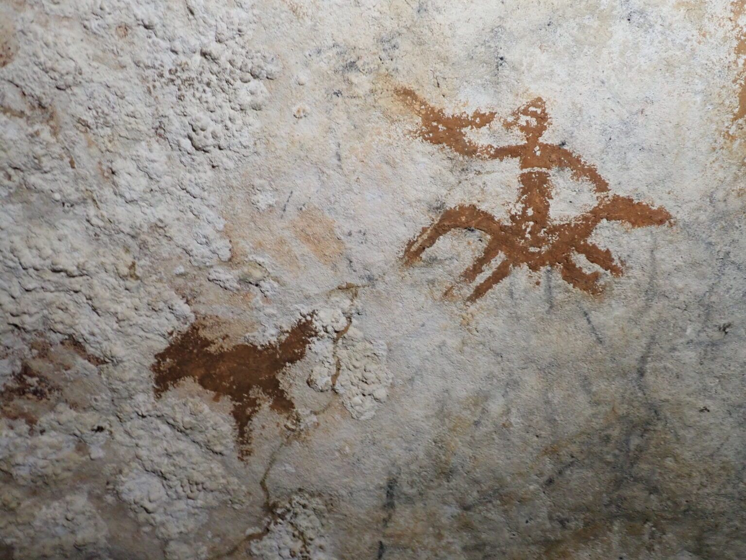 World’s oldest rock art holds clues to early human migration to ...